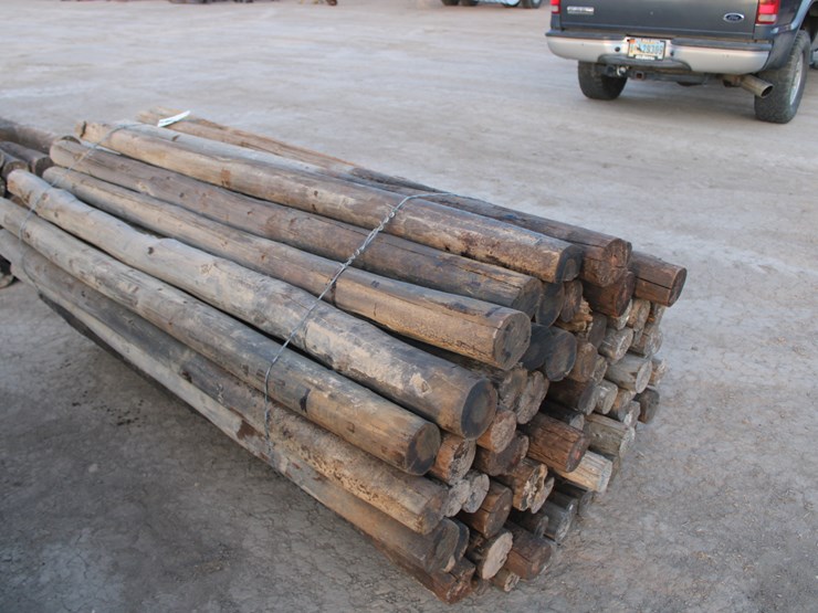 #708 • 6.5 ft Creosote Line Posts by Kerr Auction - Auction Resource