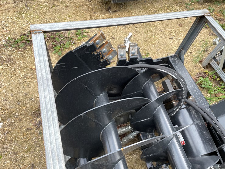 #2466 • JCT Skid Steer Auger Drive Attachment by Hansen Auction Group | Auction Resource