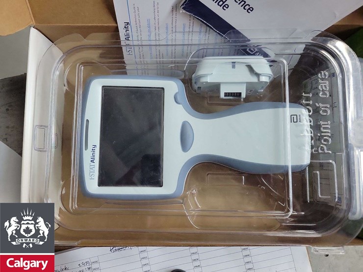 Case with 2x oxygen tanks with 5boxes of i-STAT Alinity by Yoder & Frey ...