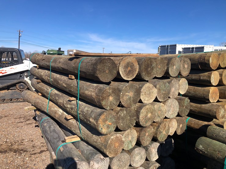 #590 • (24) 7” x 8’ TREATED WOOD FENCE POSTS by Van Massey Auction ...